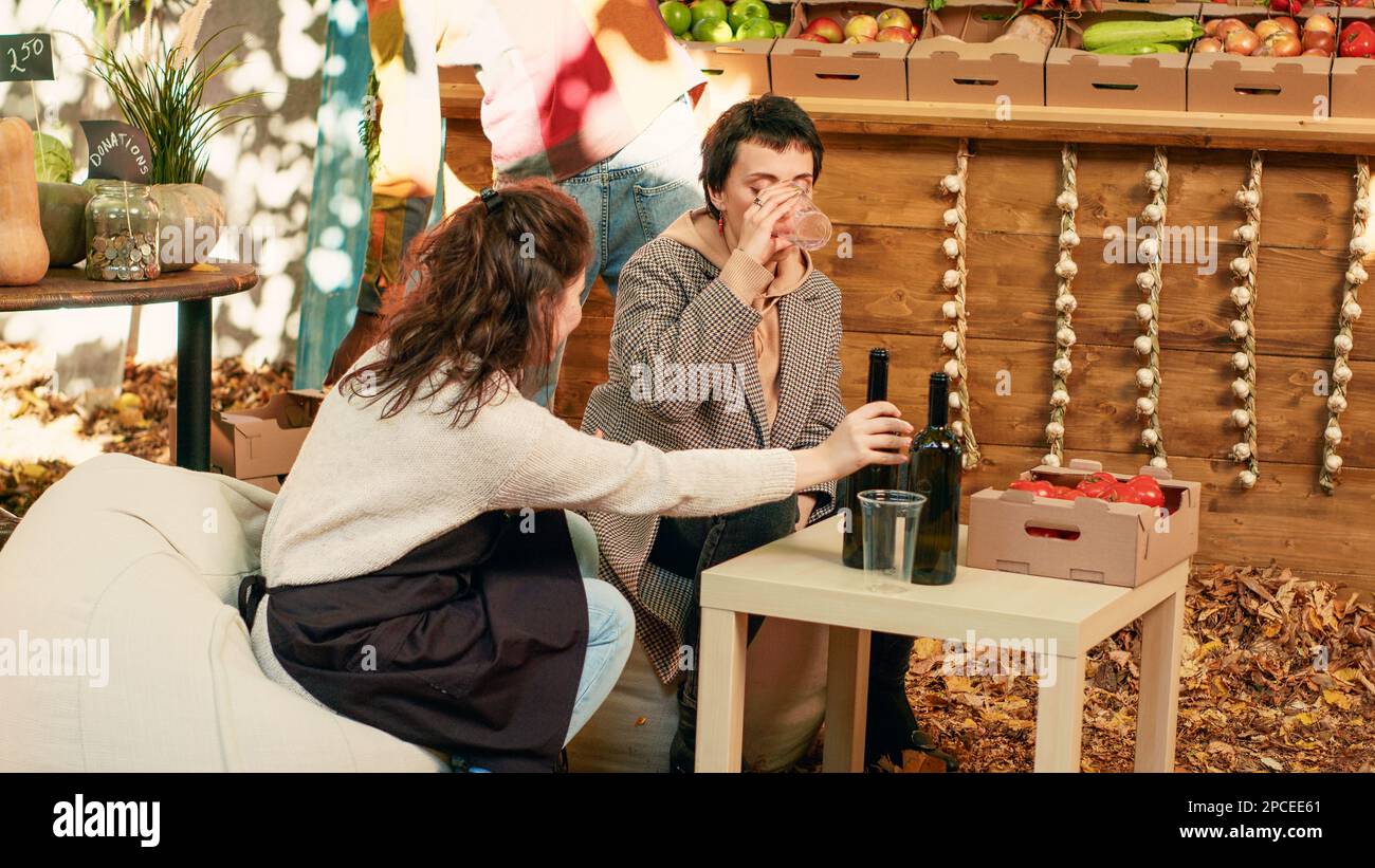 Group of women meeting at street fair to taste organic wine, tasting ...