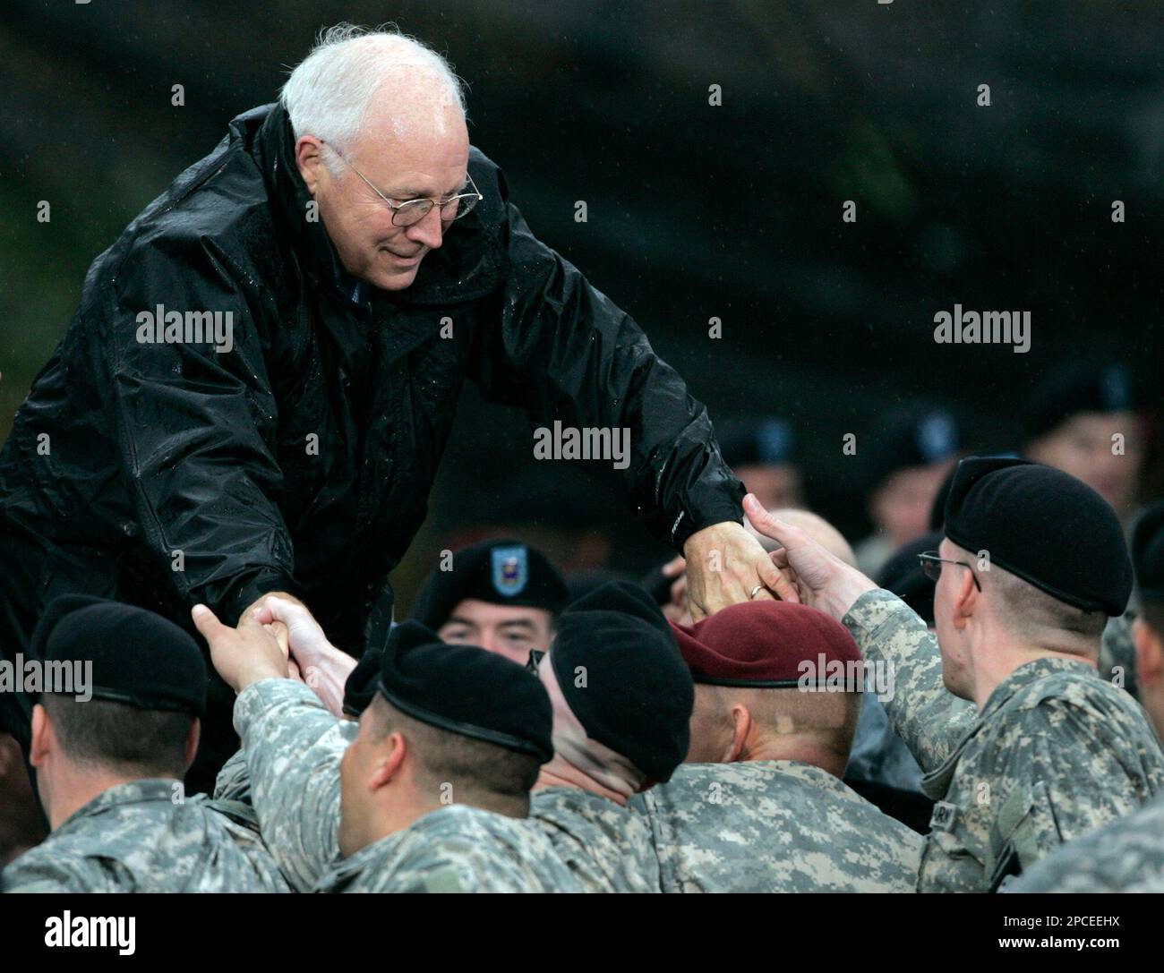 Vice President Dick Cheney shakes hands with members of the 101st ...