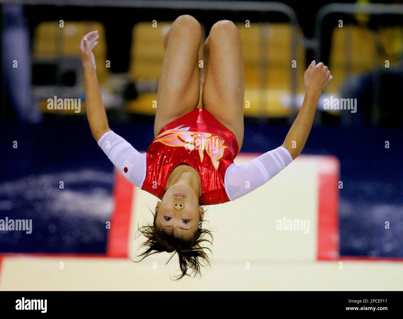 Ayaka Sahara of Japan performs her routine on the beam during women's ...