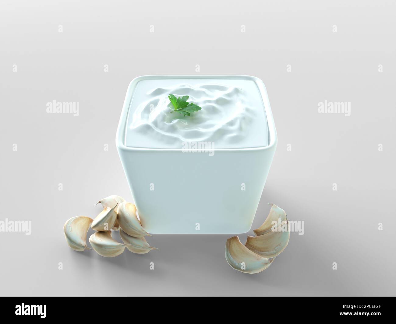 Container full of Garlic sauce. White garlic sauce bowl and heads of ...