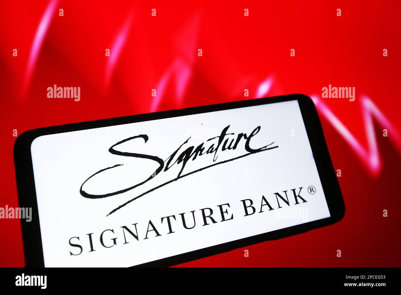 In this photo illustration, Signature Bank logo is seen on a smartphone ...