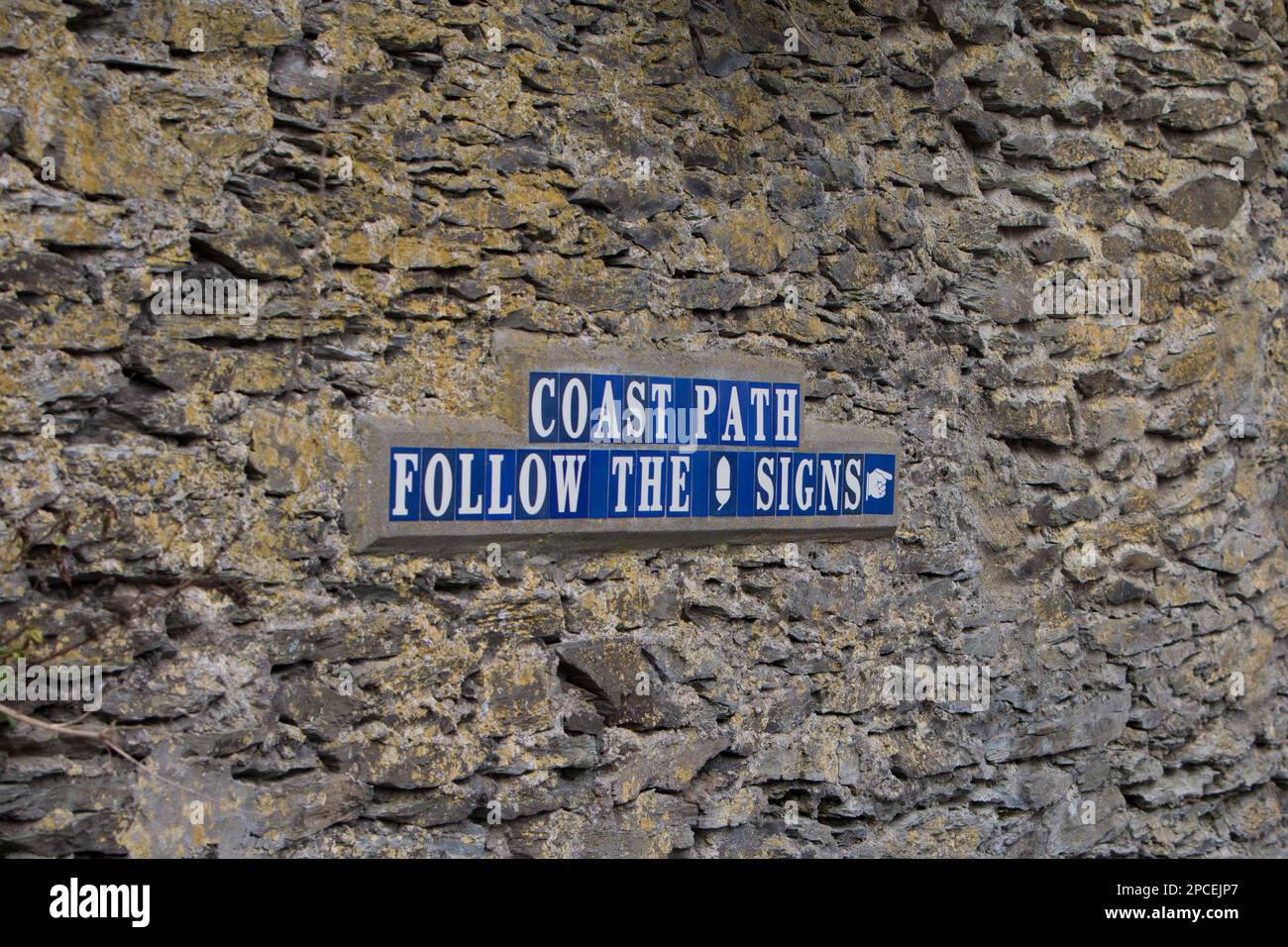 Southwest Coast Path sign inlaid into wall. Devon. England. UK. 2023 ...