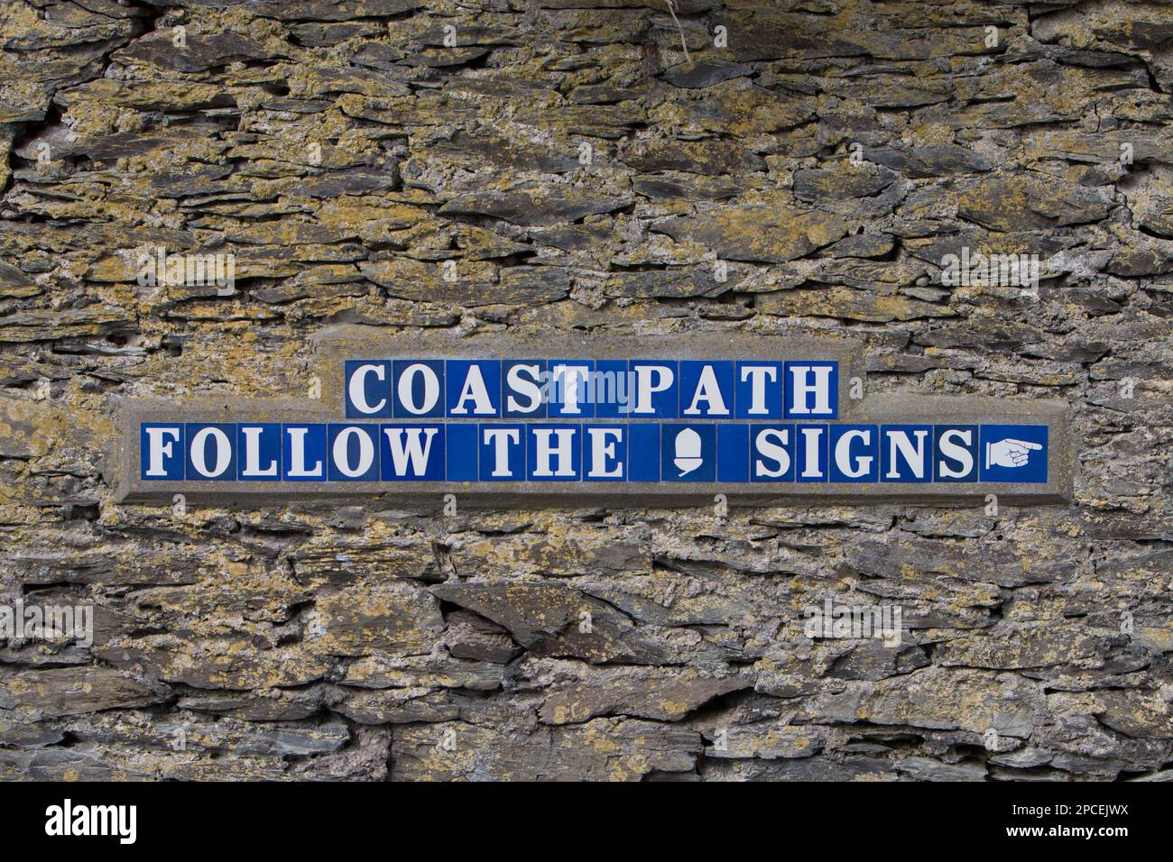 Southwest Coast Path sign inlaid into wall. Devon. England. UK. 2023 ...