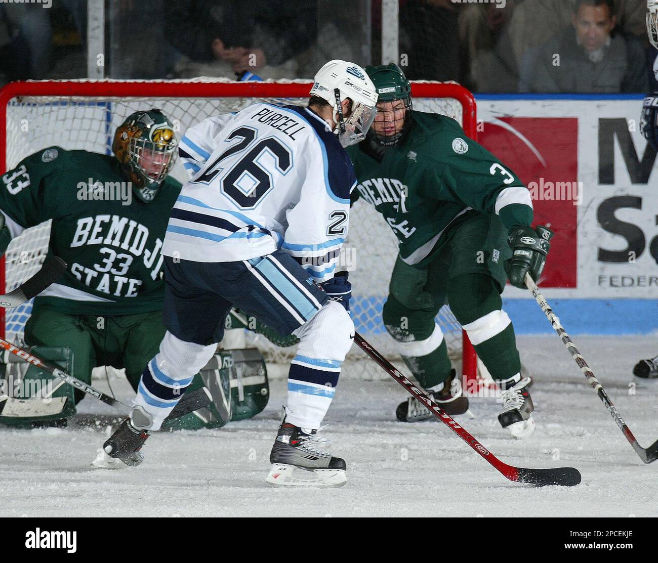Maine winger Ted Purcell (26) draws a bead on the net with Bemidji ...