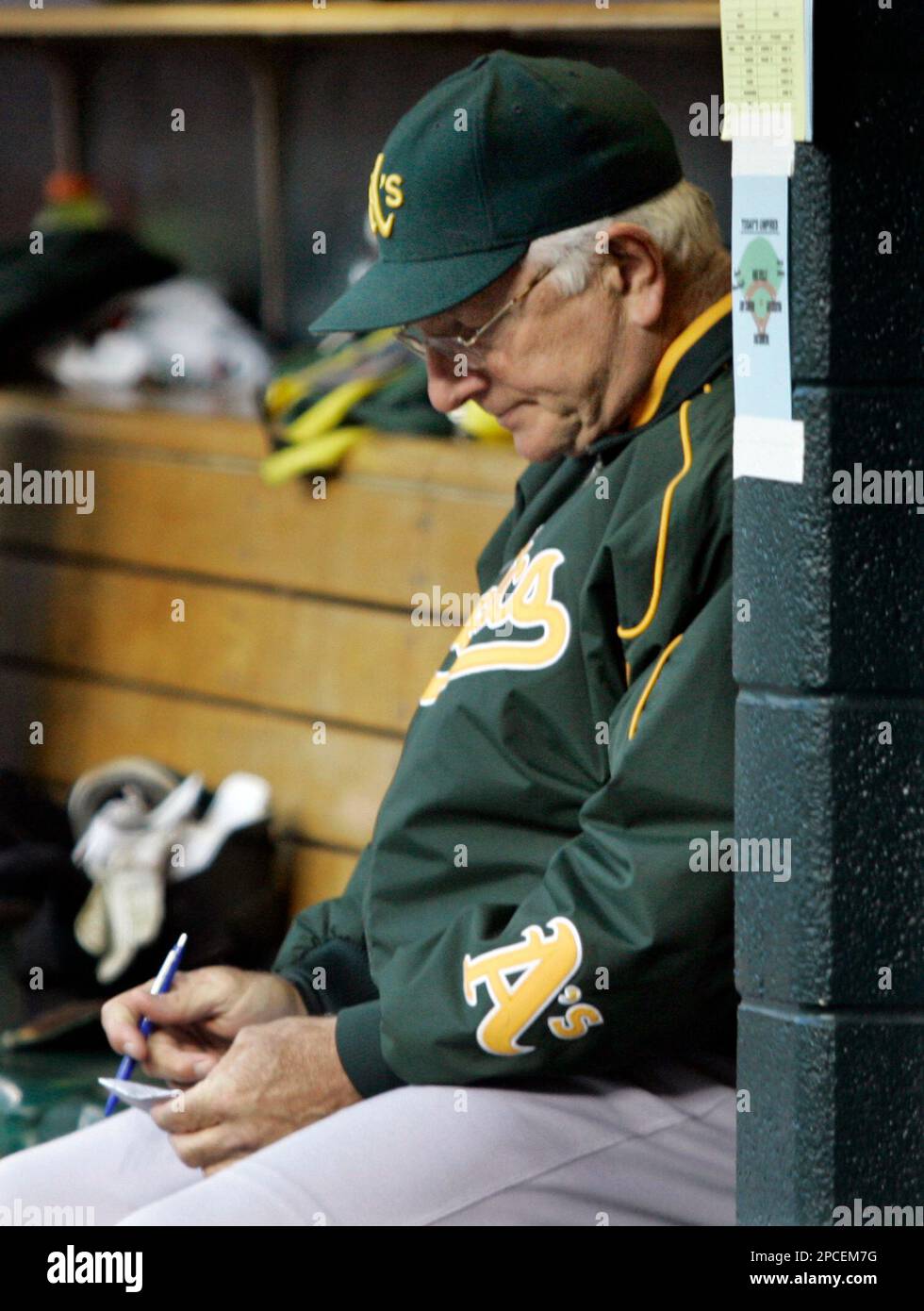 Oakland Athletics manager Ken Macha looks over his batting order in the ...