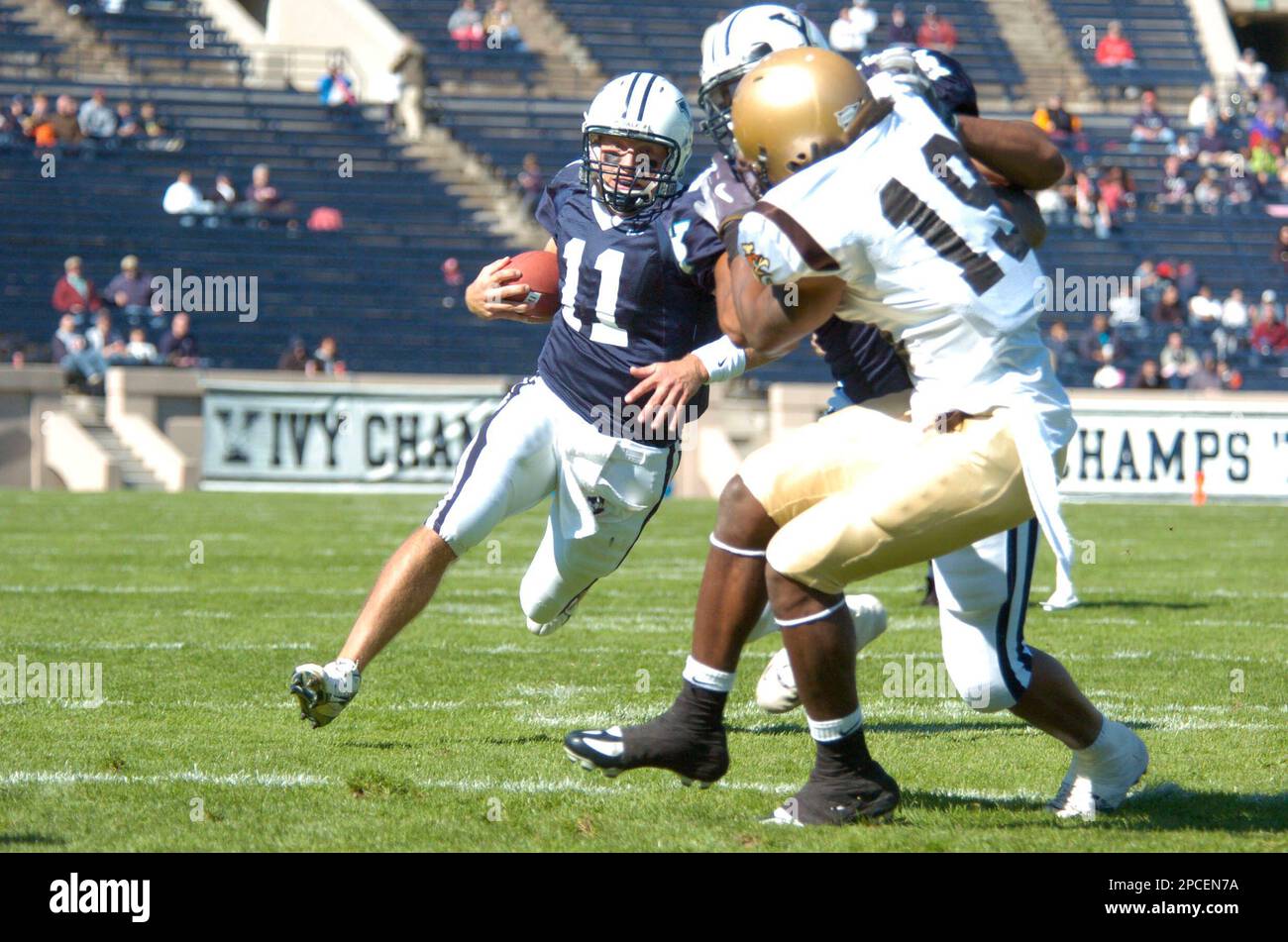 Yale quarterback Matt Polhemus (11) runs the ball past Lehigh defenders ...