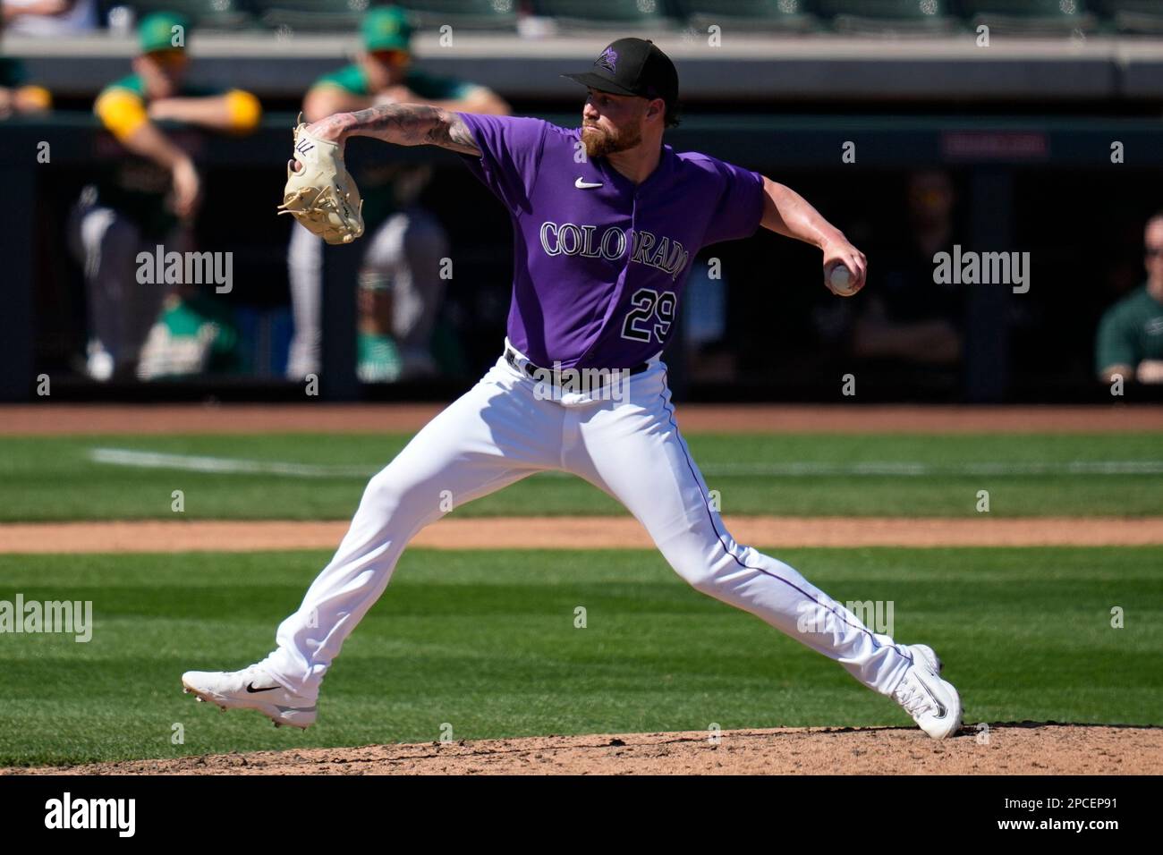 Colorado Rockies relief pitcher Logan Allen throws during the third ...