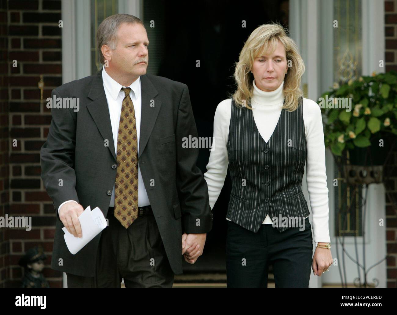 ** FILE ** Dallas County Sheriff Brian Gilbert walks to a news ...