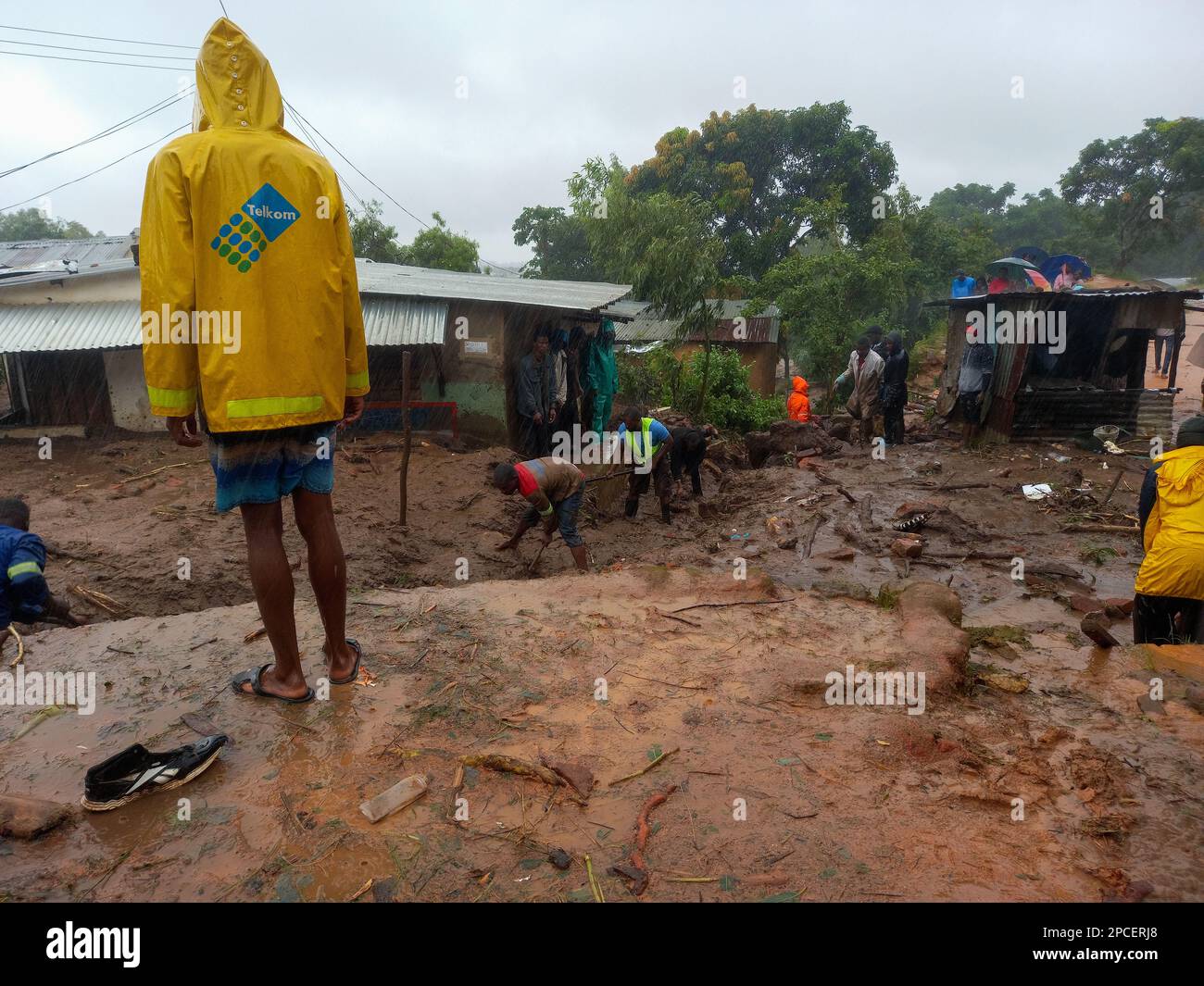 Blantyre, Malawi. 13th Mar, 2023. Rescuers clear the mud in Chilobwe ...