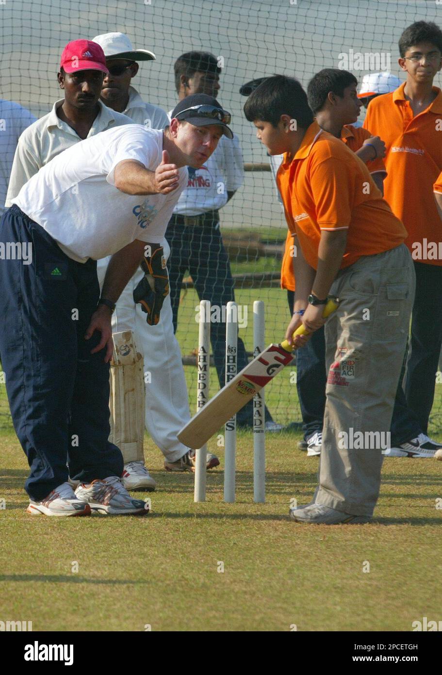 Australian cricket Captain Ricky Ponting, left, gives batting tips to ...