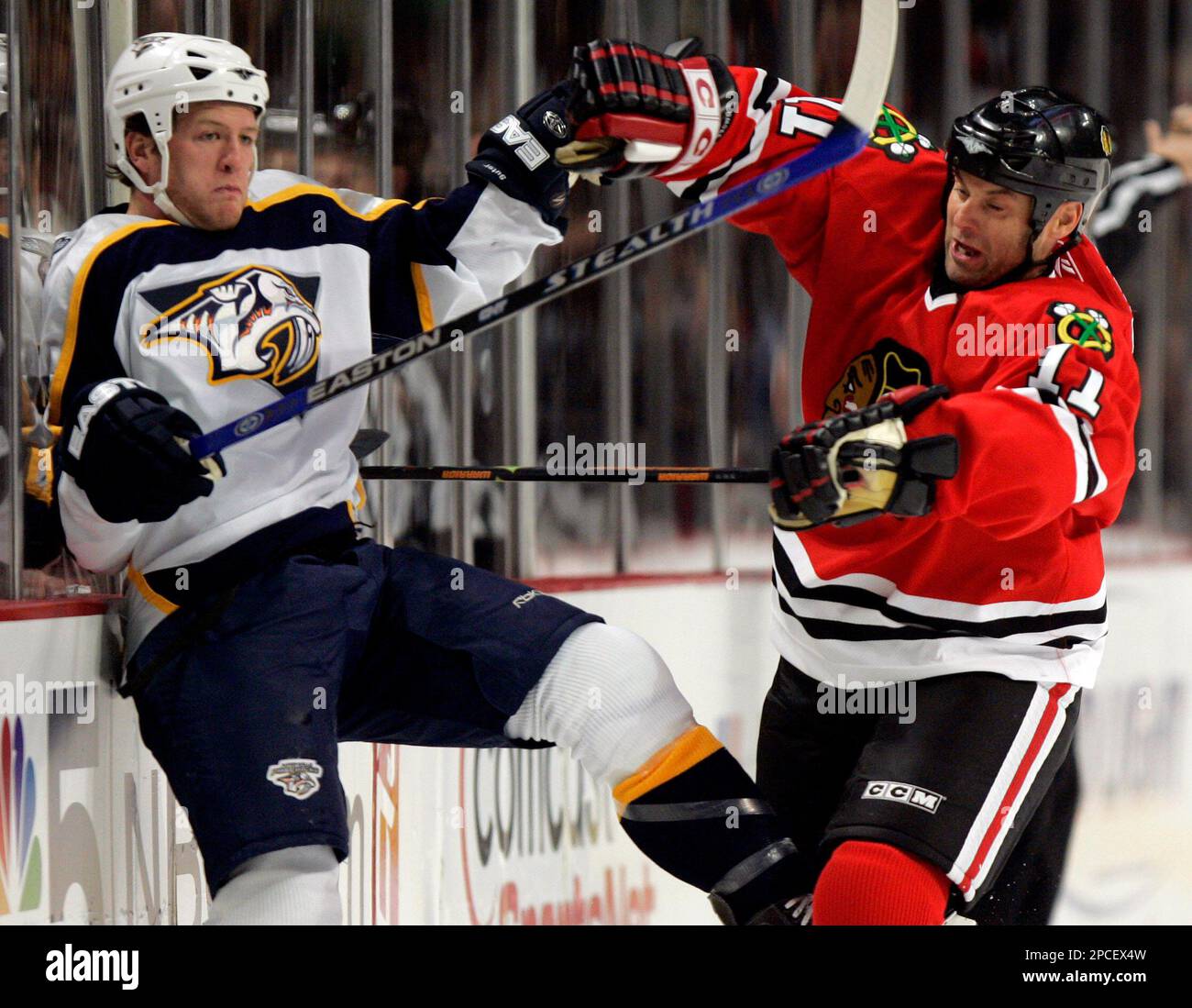 Nashville Predators' Ryan Suter, left, and Chicago Blackhawks' Bryan ...