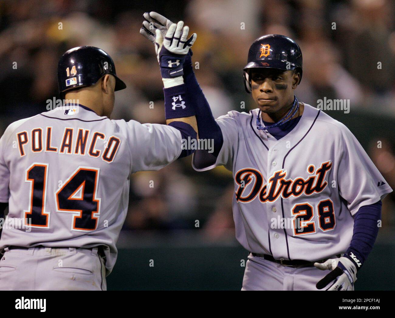 Detroit Tigers Curtis Granderson (28) is congratulated by his teammate ...