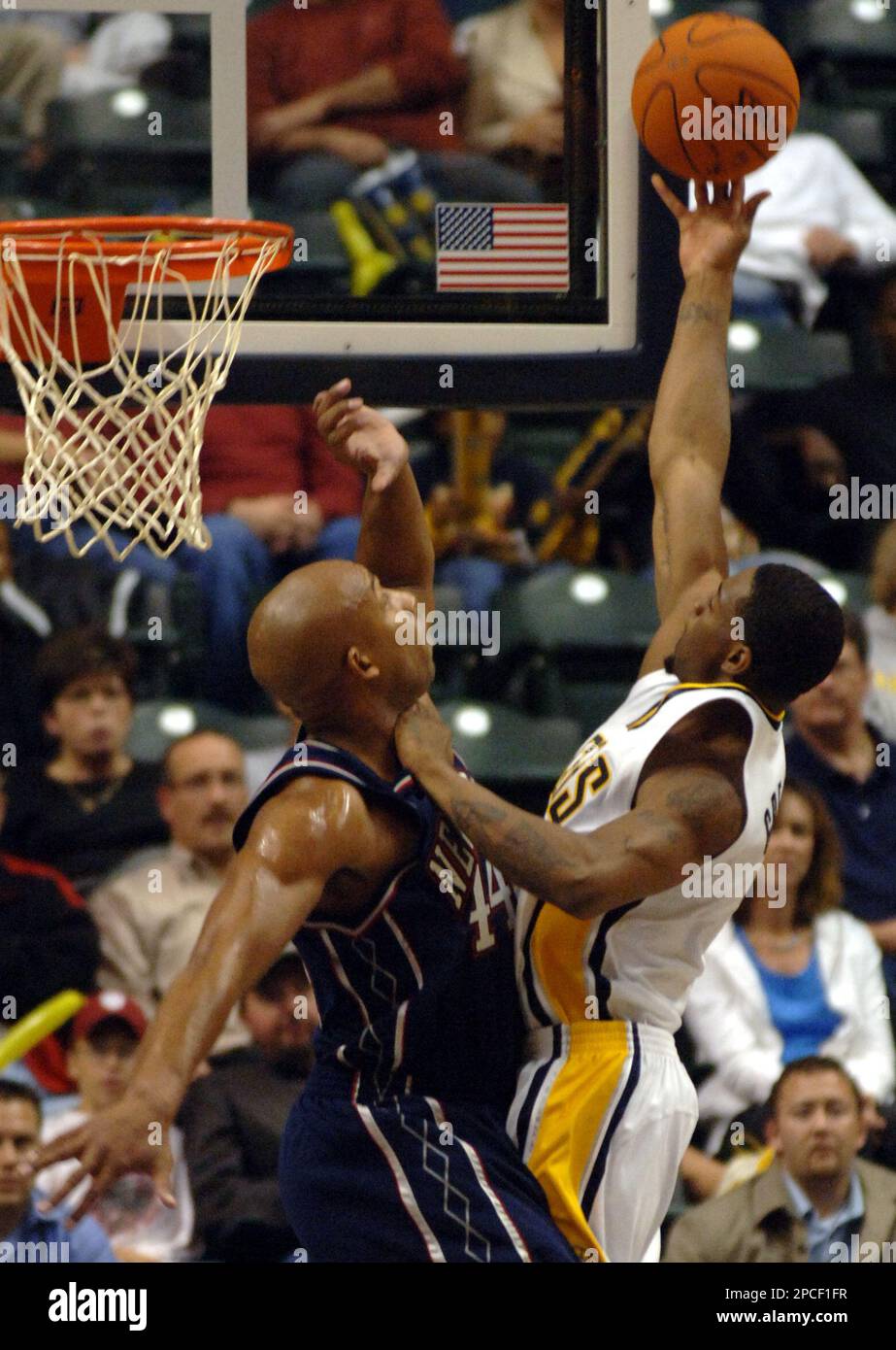Indiana Pacers' Maceo Baston shoots over New Jersey Nets' Darvin Ham ...