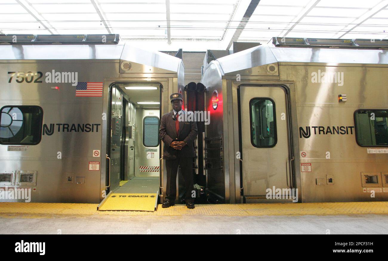 Conductor Leonard Grayson stands outside the New Jersey Transit's new ...