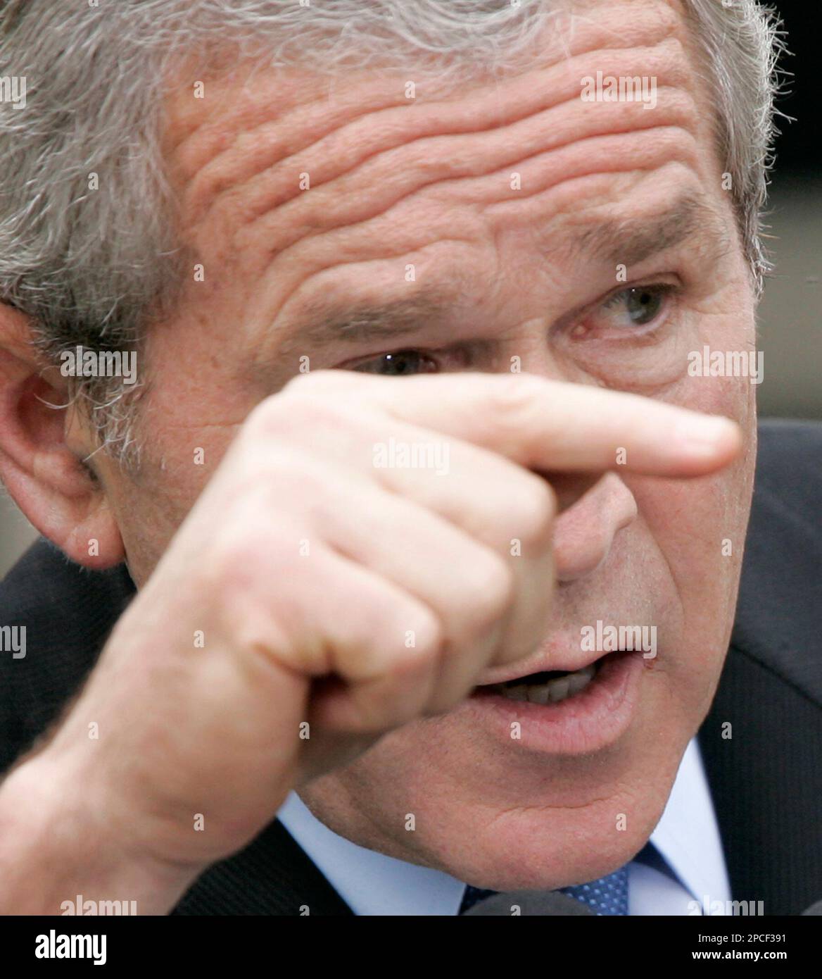 President Bush gestures during a news conference in the Rose Garden of ...