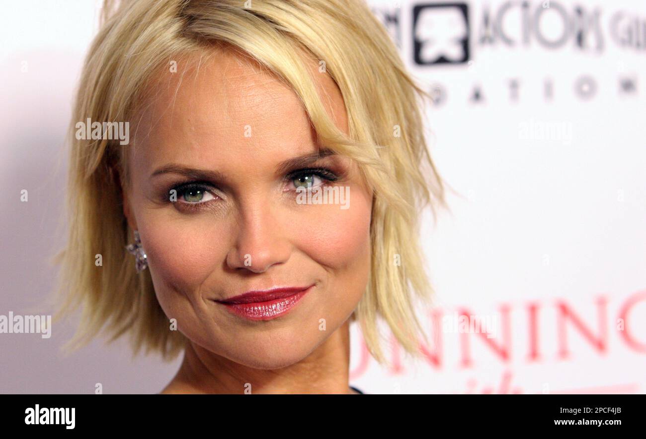 Kristin Chenoweth poses for photographers as she arrives at the world ...