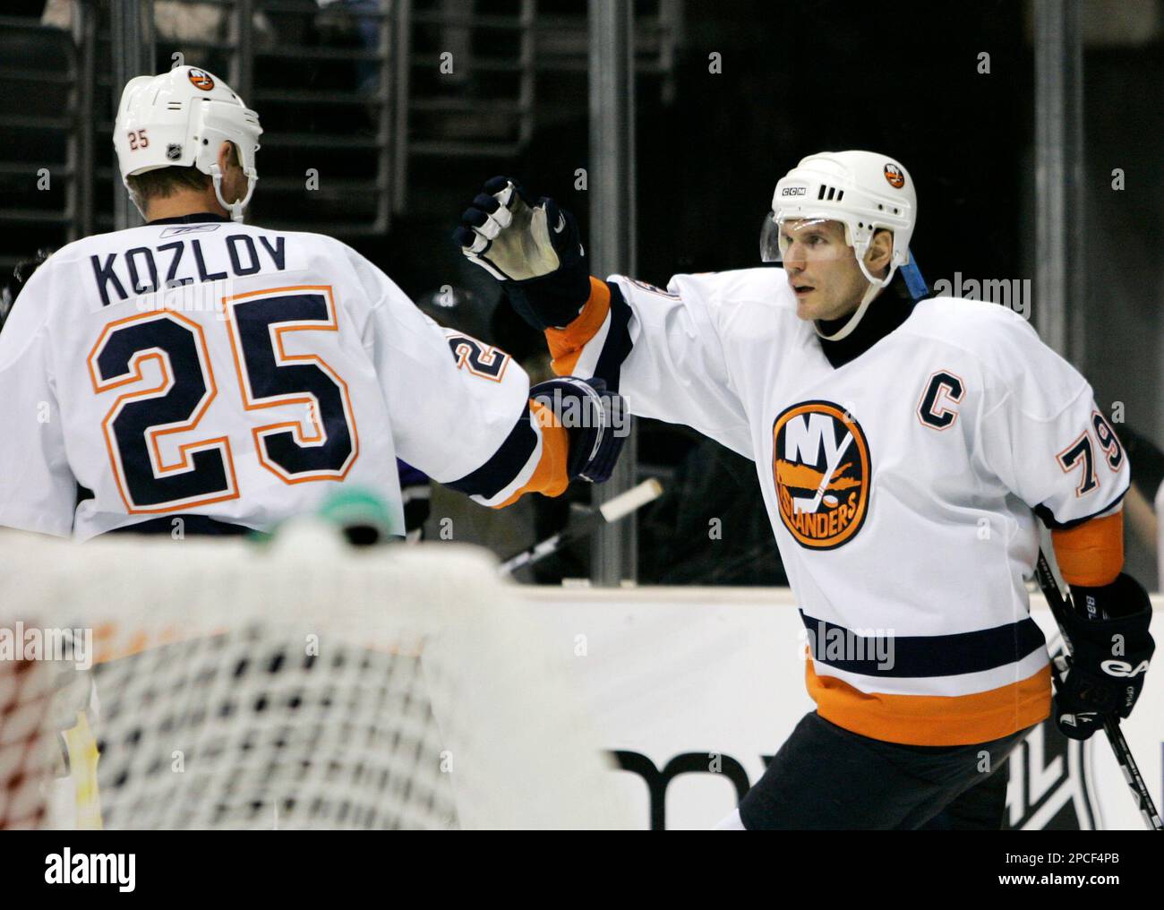 New York Islanders' Alexei Yashin (79), of Russia, celebrates his goal ...