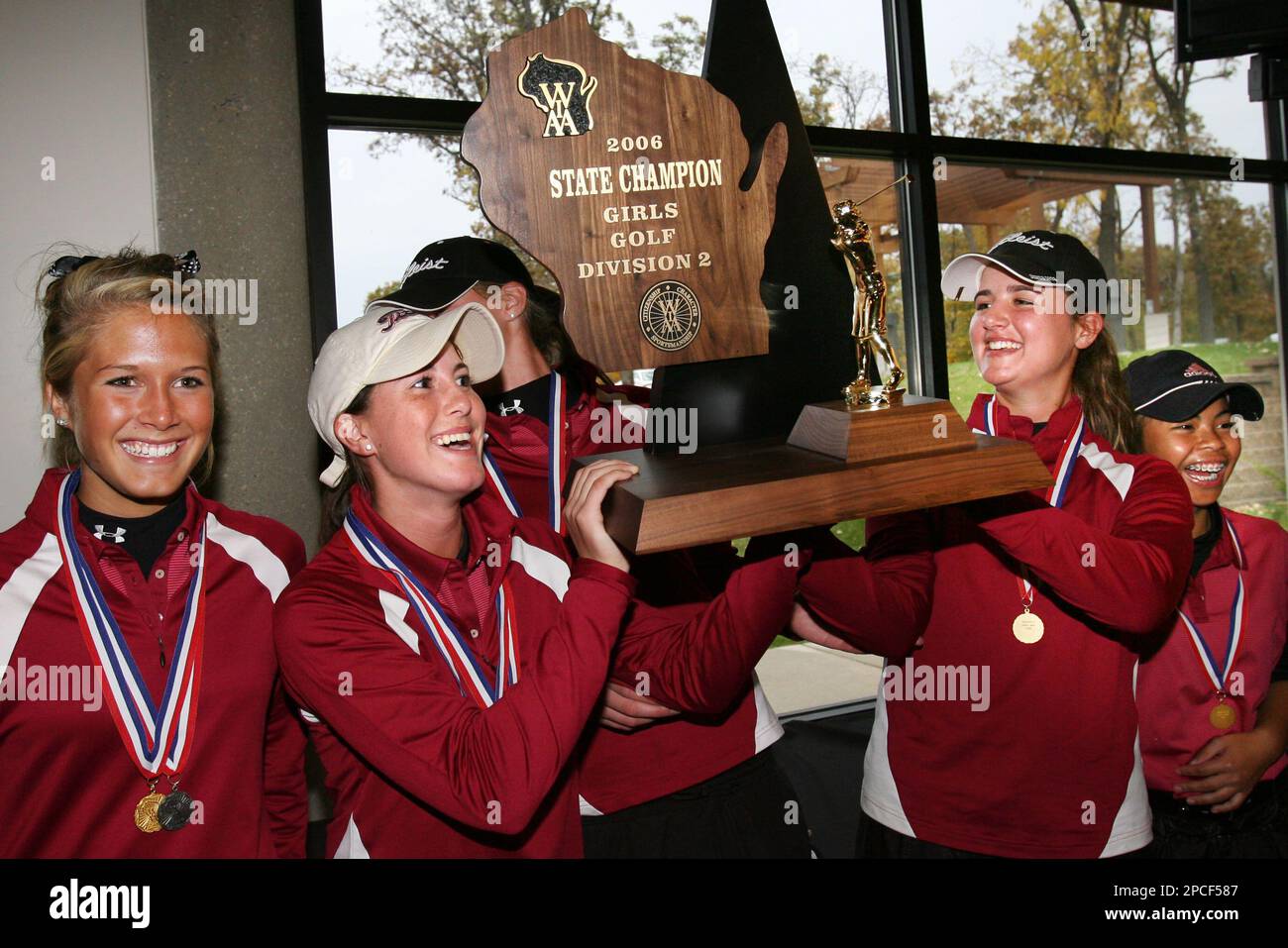 Madison Edgewood's Alyssa Elliott, from left, Michelle Hird, Alex Lake ...