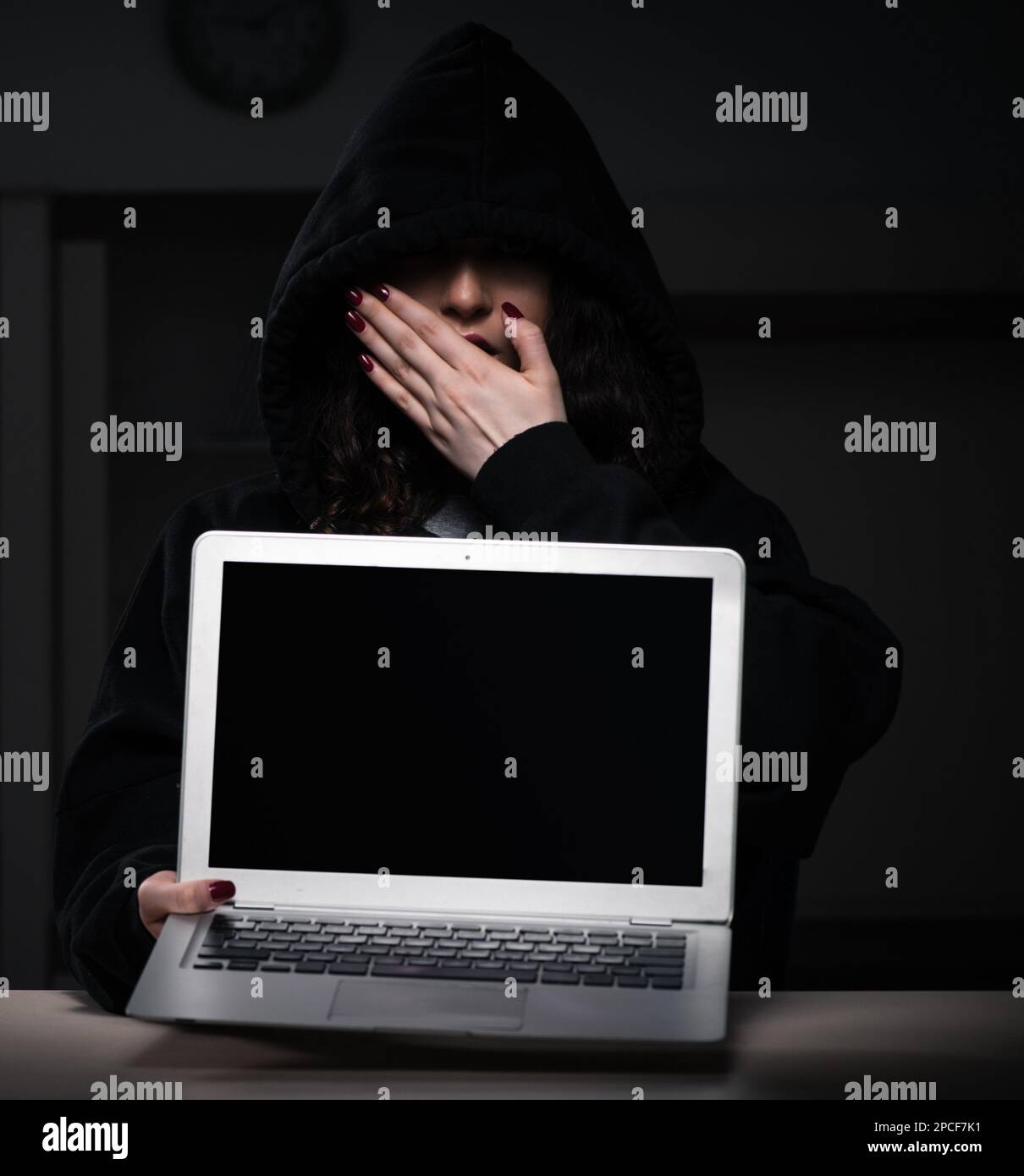 The female hacker hacking security firewall late in office Stock Photo ...