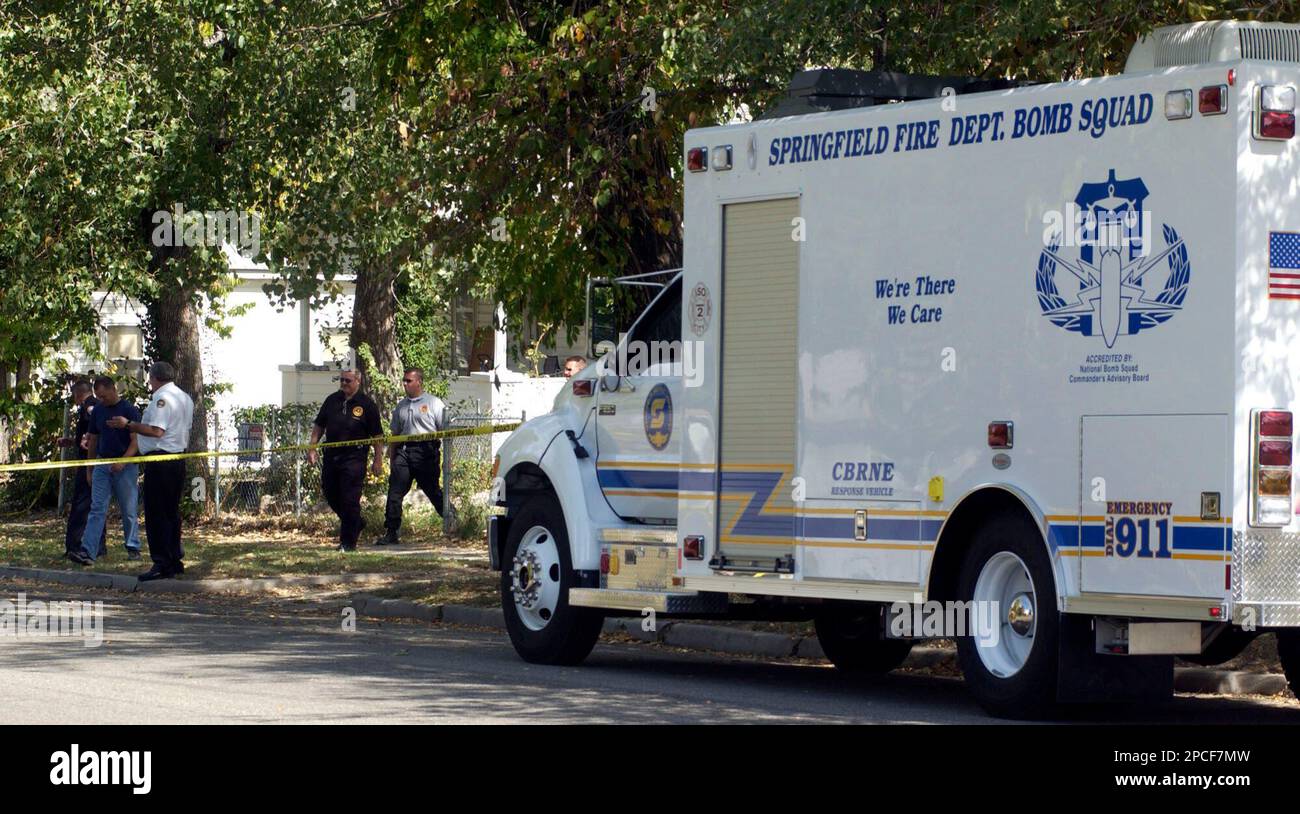 Members of the Springfield Fire Department Bomb Squad and Joplin Police ...