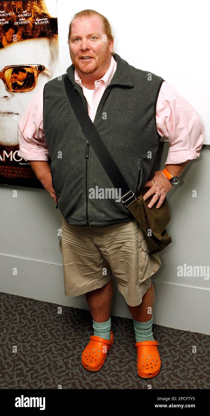 Chef Mario Batali poses for photographers during red carpet arrivals at ...