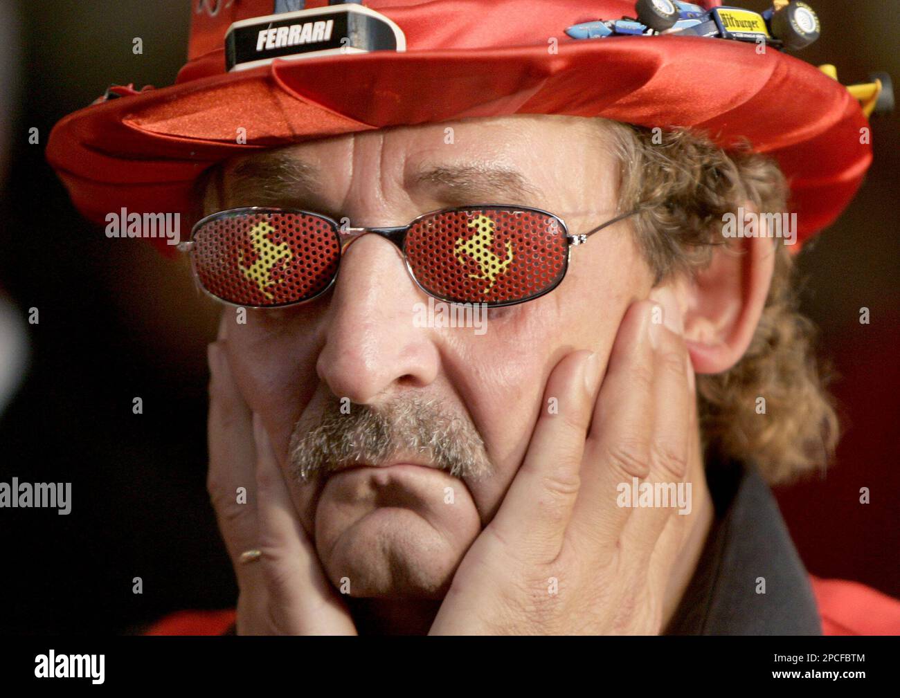 A supporter of Germany's FI driver Michael Schumacher, Reiner Ferling ...