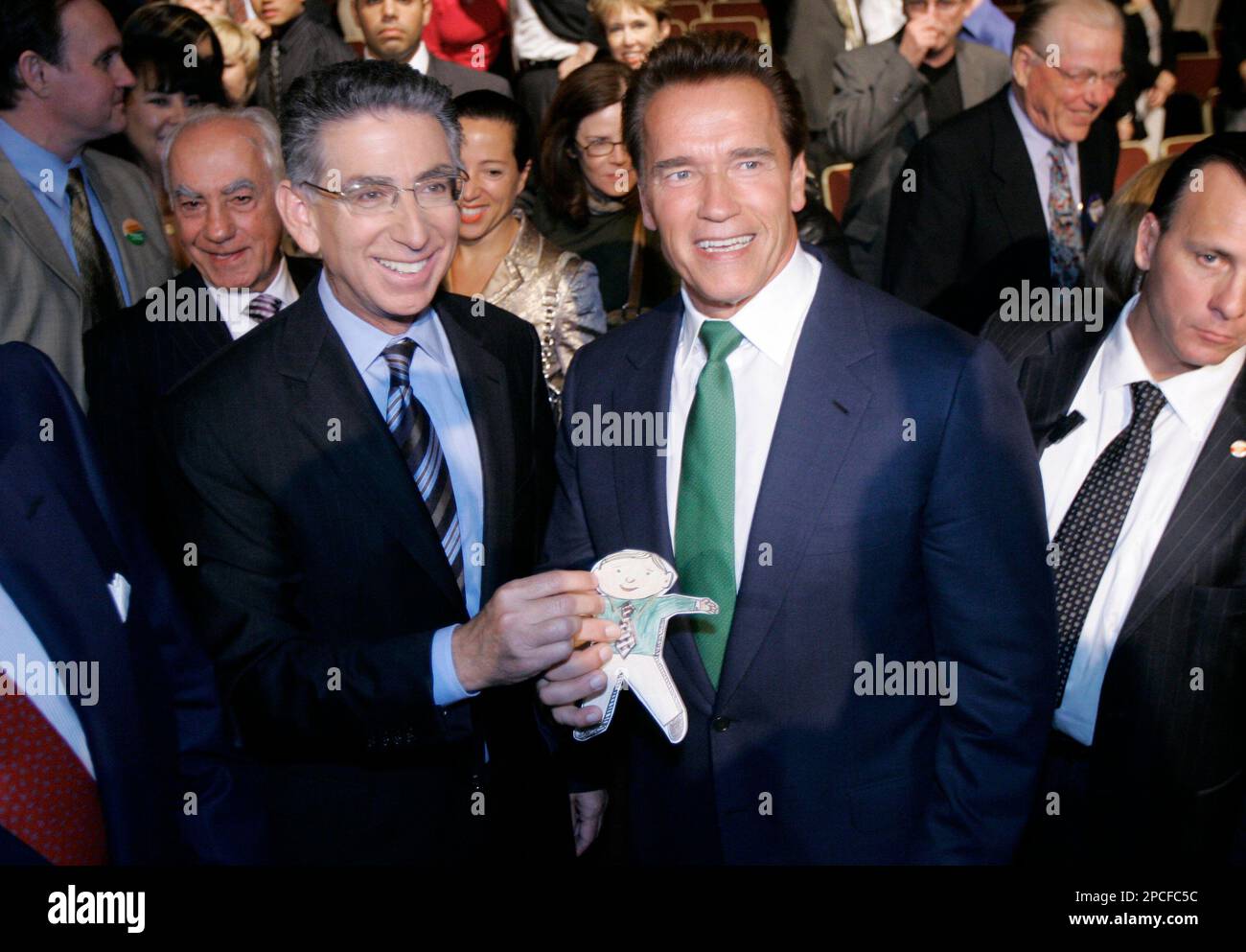 California Treasurer Phil Angelides, left, poses with Gov. Arnold ...