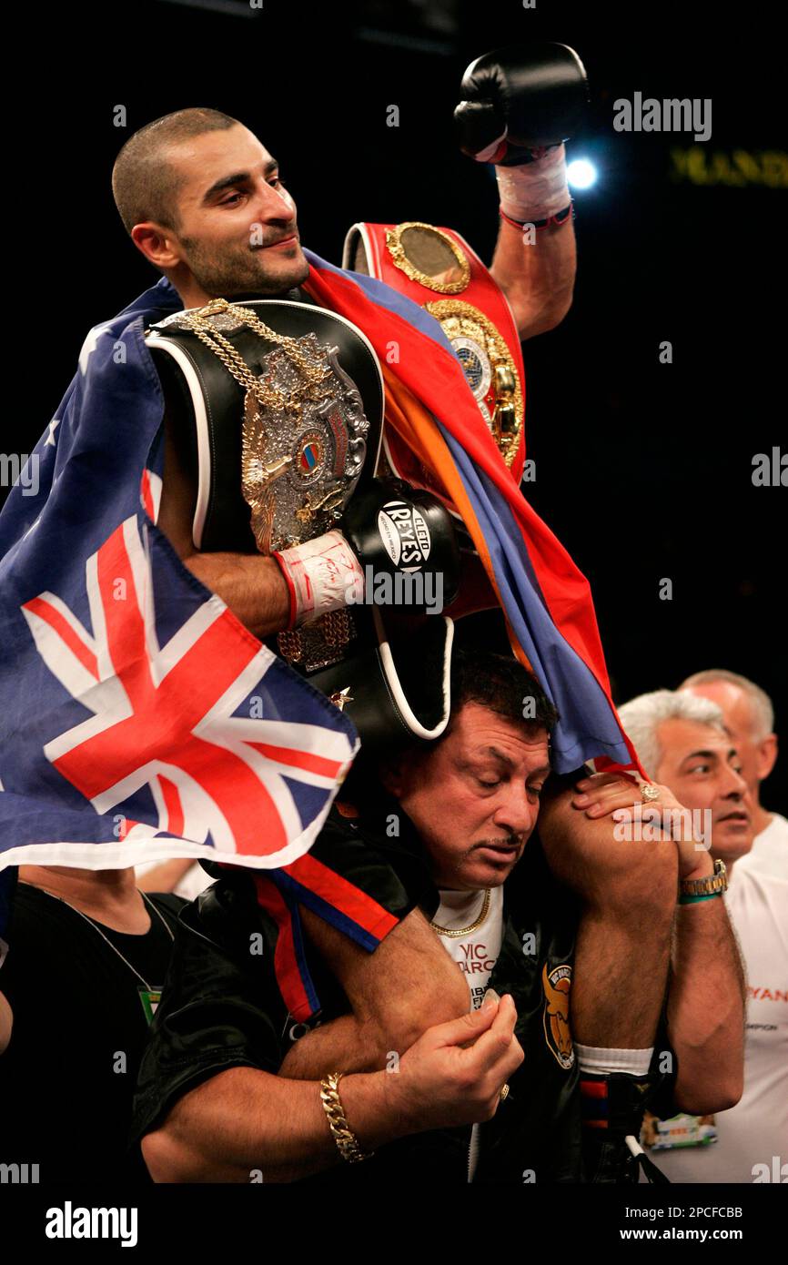 Vic Darchinyan, of Armenia, celebrates his 6-round technical decision ...