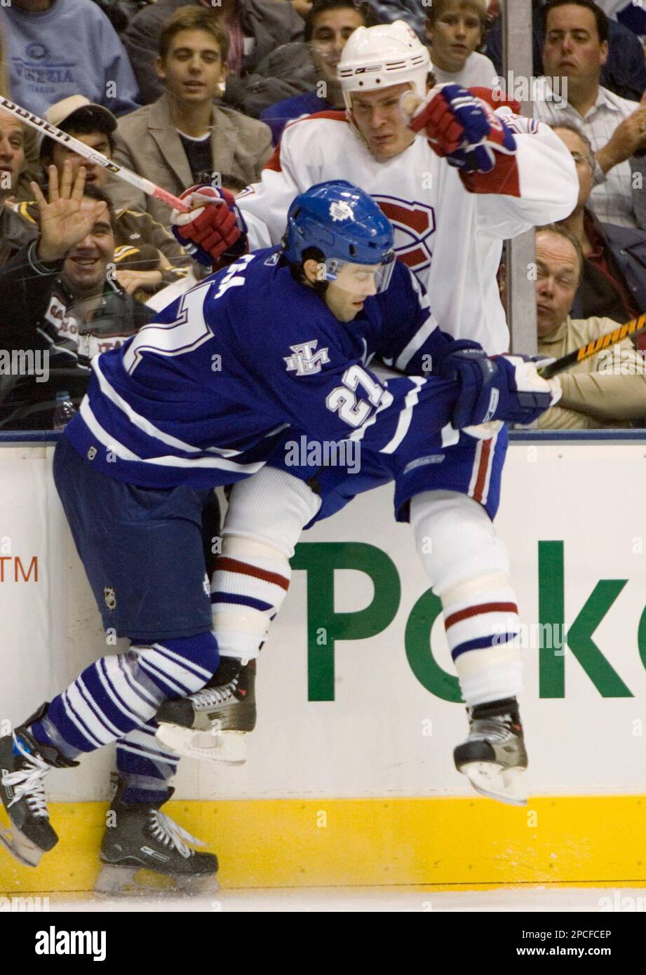 Toronto Maple Leafs Michael Peca sends Montreal Canadiens Garth Murray ...