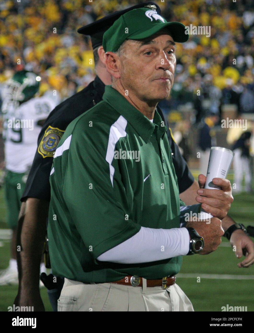 Michigan State coach John L. Smith leaves the field following a 31-13 ...