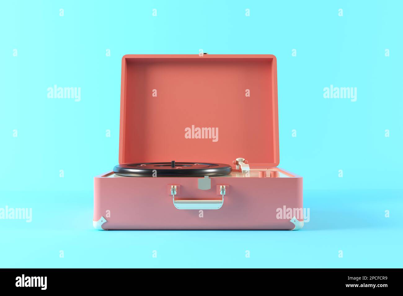 Retro record player in a fashionable pink vintage case. The record ...