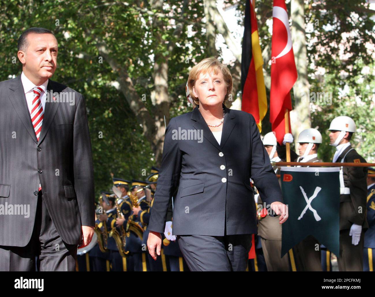 German Chancellor Angela Merkel, right, and her Turkish counterpart ...
