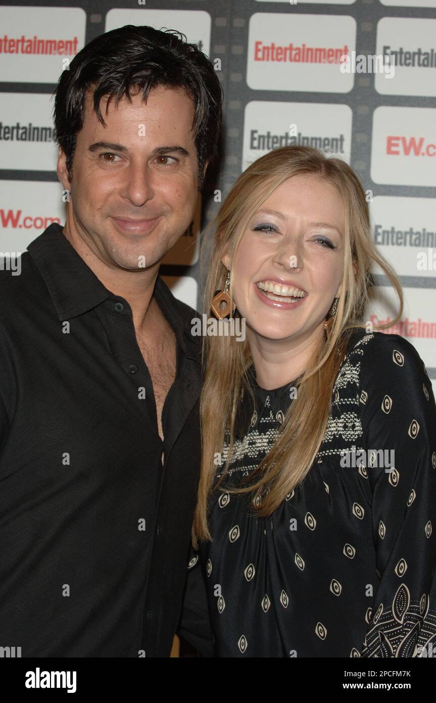Actress Jennifer Finnigan, actor Jonathan Silverman pose on the red ...
