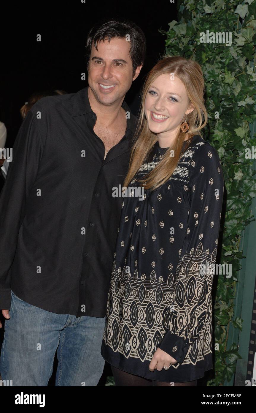 Actors, Jonathan Silverman,and Jennifer Finnigan pose on the red carpet ...