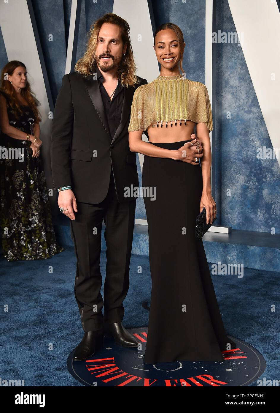 Marco Perego and Zoe Saldana arriving at the Vanity Fair Oscar Party ...