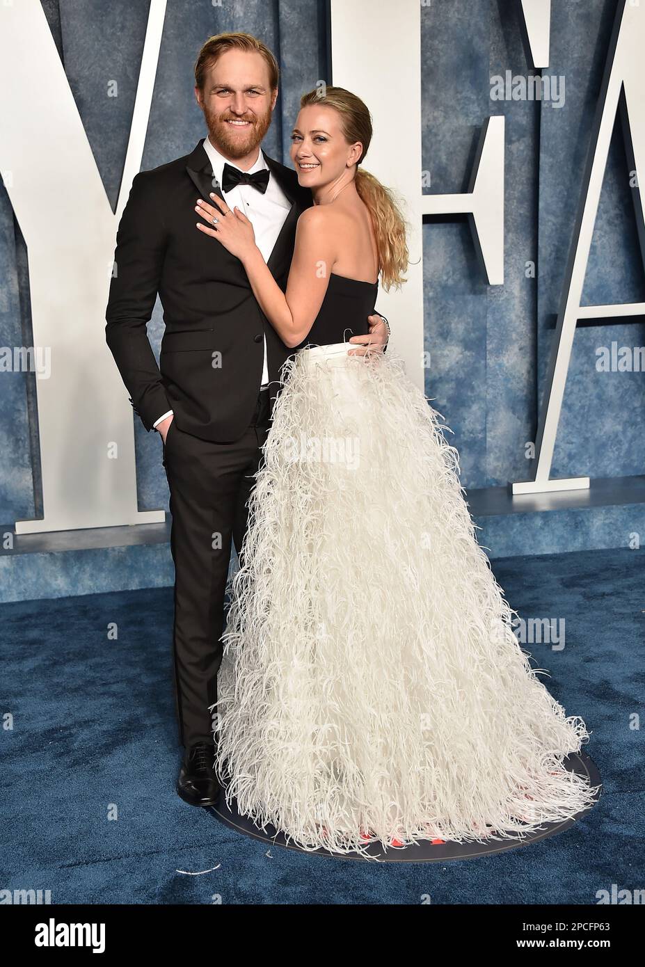 Wyatt Russell and Meredith Hagner arriving at the Vanity Fair Oscar ...