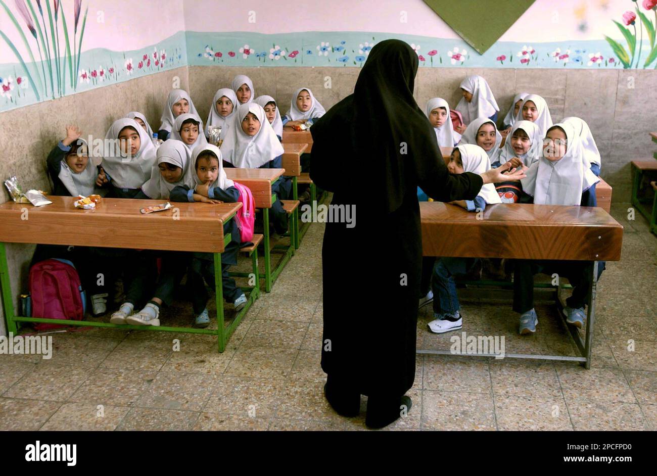 A group of girls attend first day of school in Tehran. (AP Photo/Hasan ...