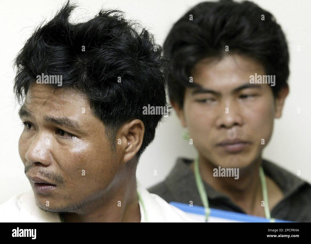 ** FILE ** Sok Sam Oeun, left, and Born Samnang, appear in front of ...