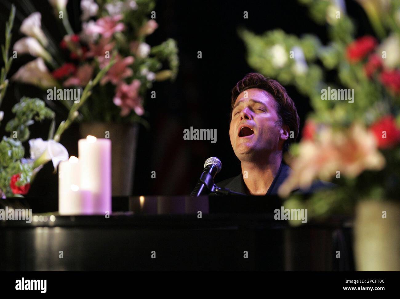 Christian rock artist, Michael W. Smith sings during a community prayer ...