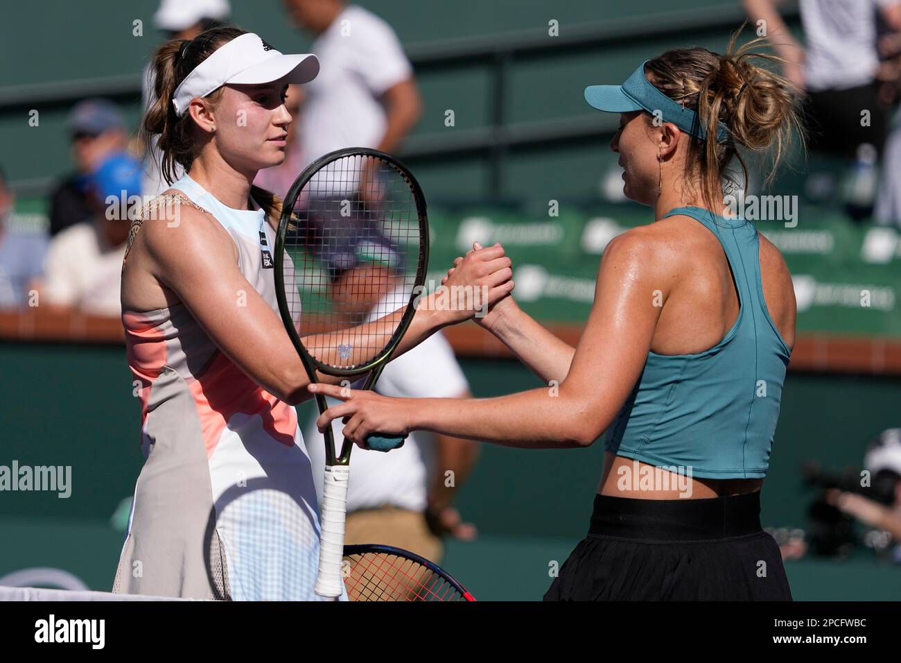 Elena Rybakina, of Kazakhstan, left, shakes hands with Paula Badosa, of ...