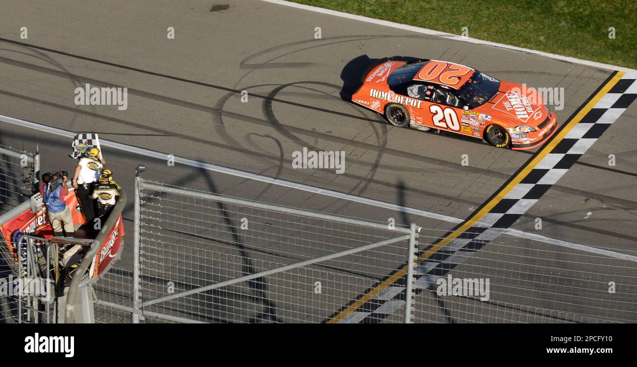 Out of gas but finishing first. Tony Stewart crosses the finish line ...