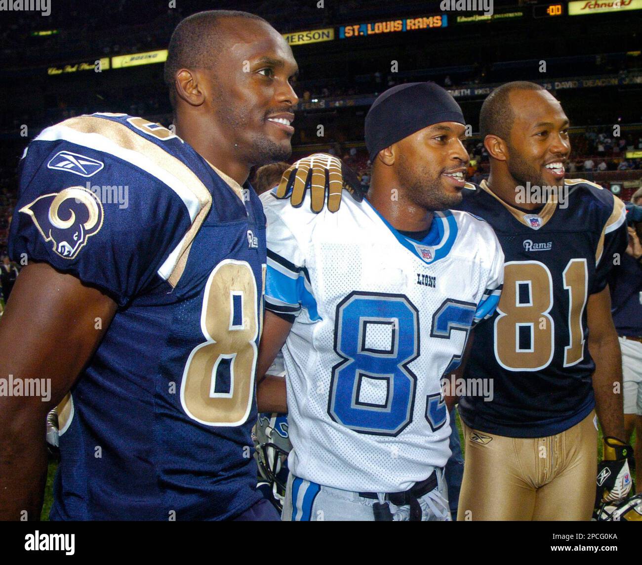 Detroit Lions' Az-Zahir Hakim, center, poses for a photo with former ...