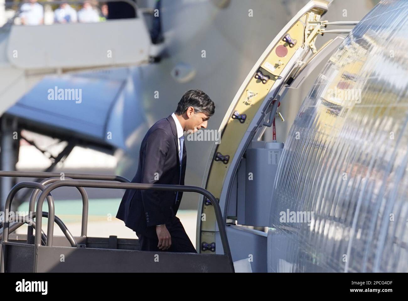 Prime Minister Rishi Sunak climbs the steps to his plane at San Diego ...