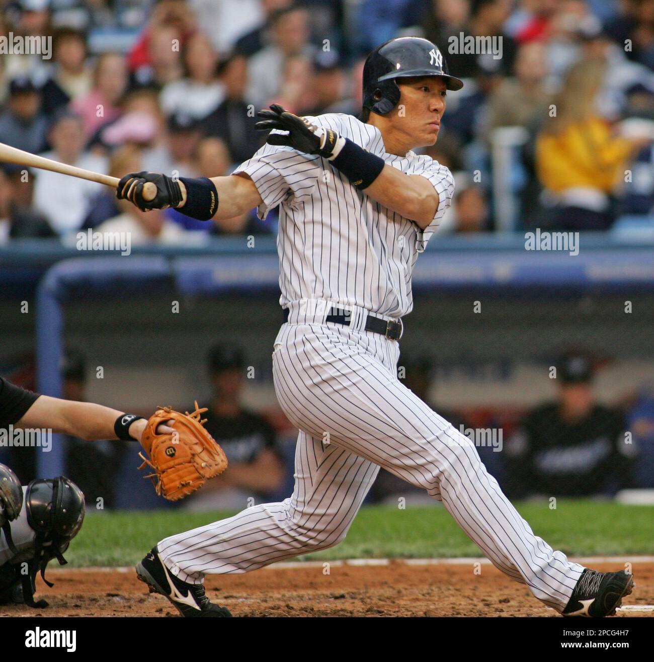 New York Yankees' Hideki Matsui gets a single against the Toronto Blue ...