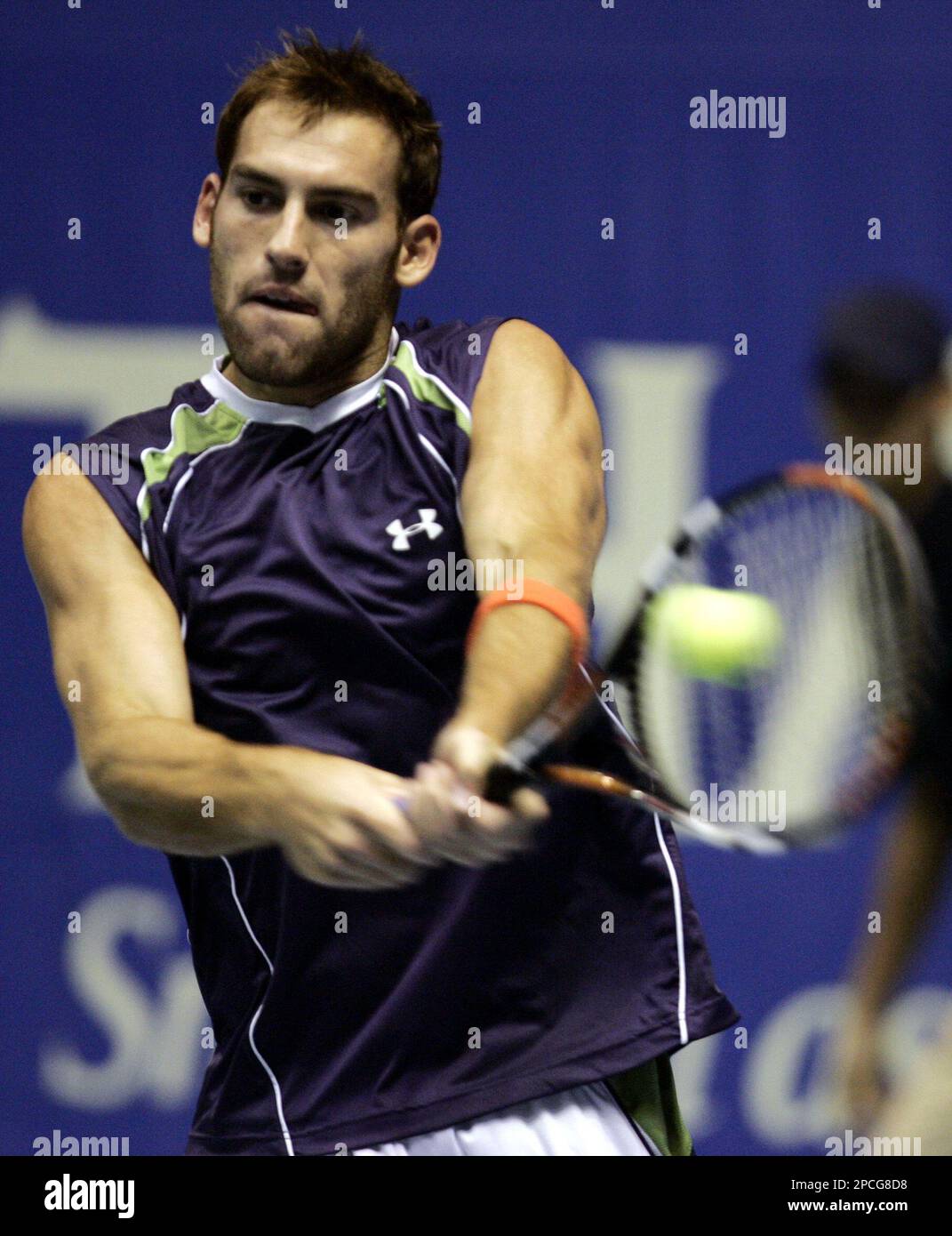 Robby Ginepri of U.S.A. hits a backhand during his quarter-final match ...