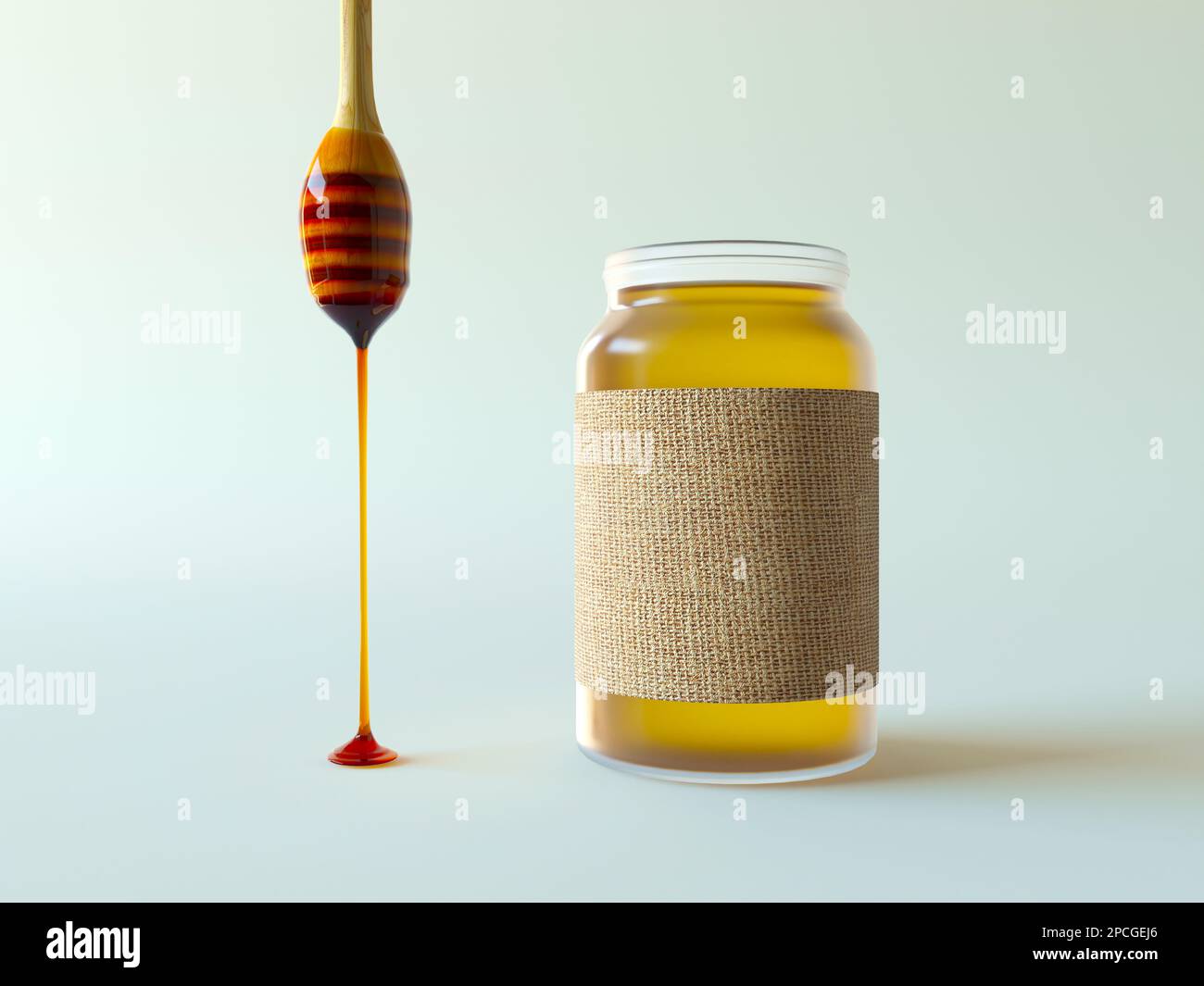 Transparent open glass jar with floral honey, in a fabric wrapper made ...