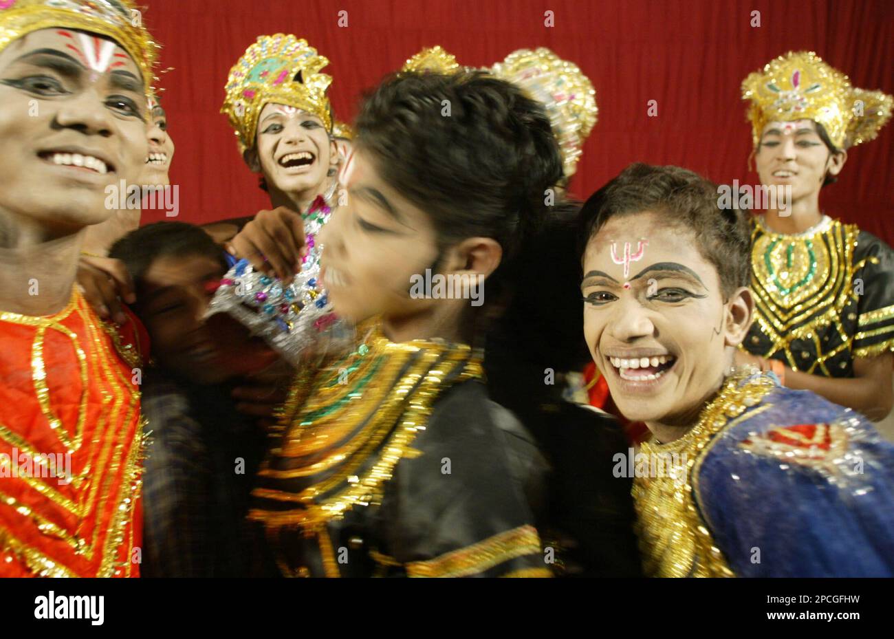 Artists dressed in costumes depicting characters from the life of Hindu ...