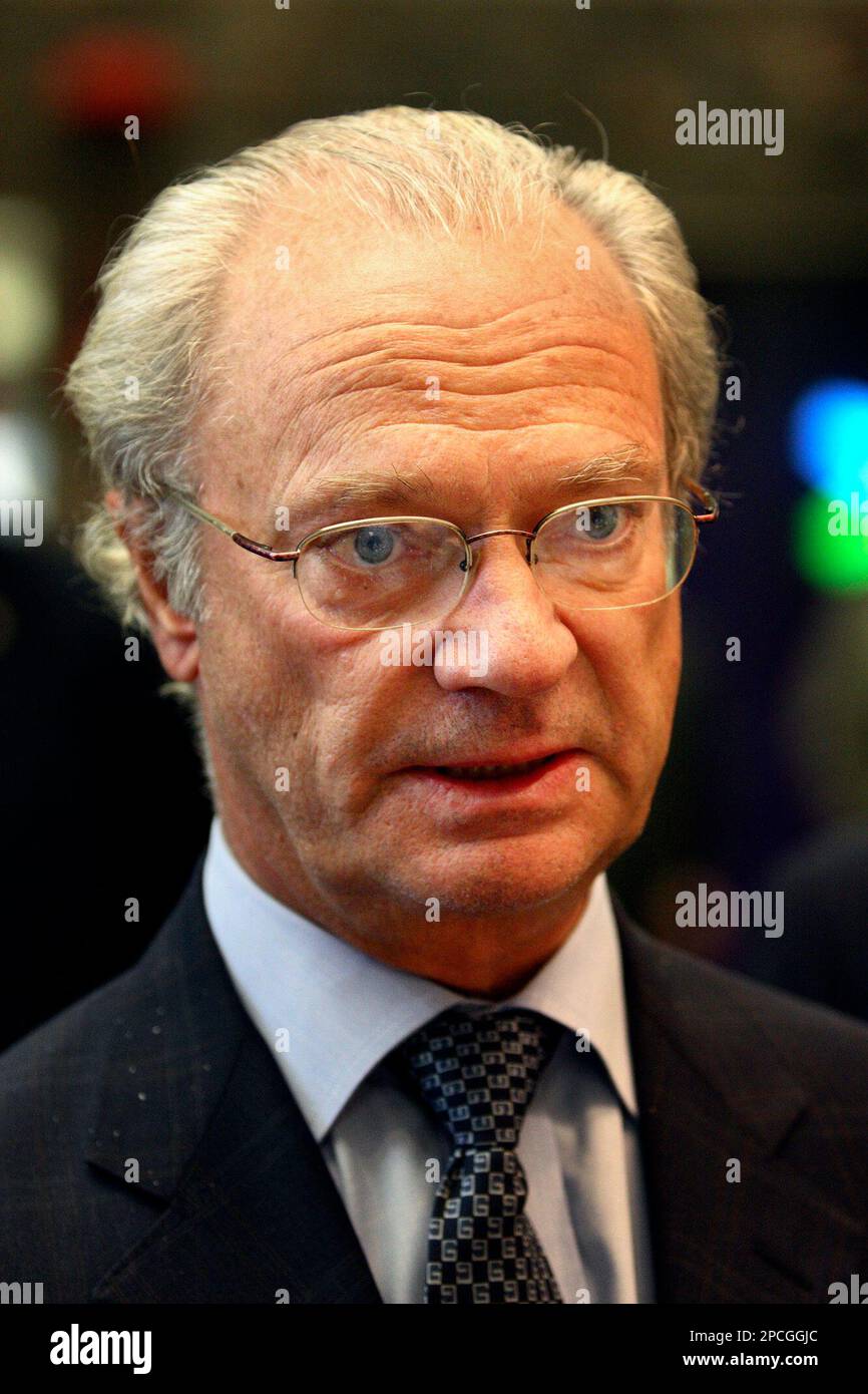 King Carl XVI Gustaf of Sweden speaks to the press after pulling the ...