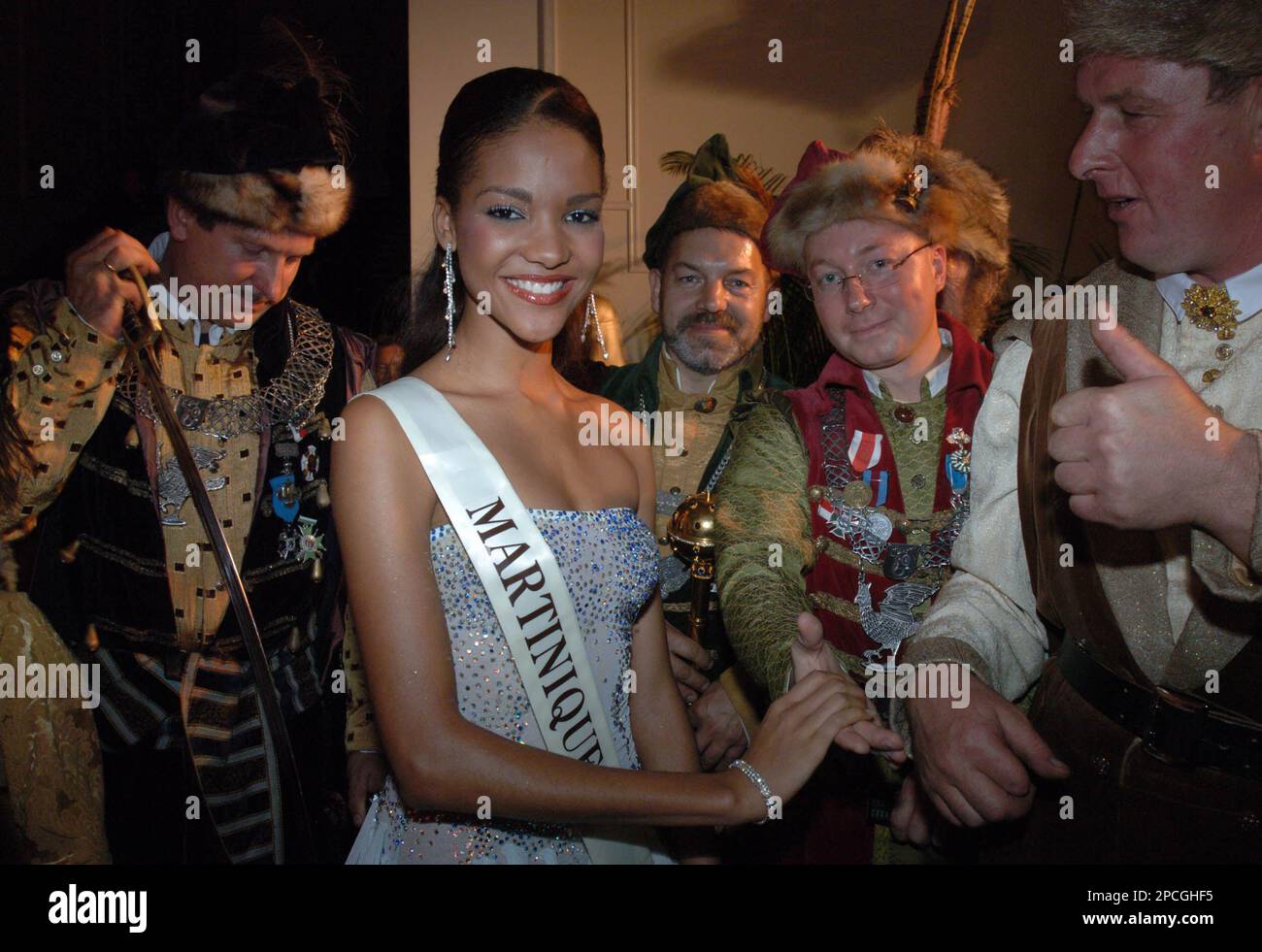 Miss Martinique Stephanie Florence Colosse poses with Polish men ...