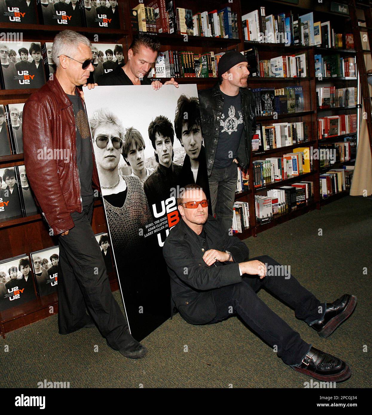 The rock band U2, left to right, Adam Clayton, Larry Mullen Jr., Bono ...